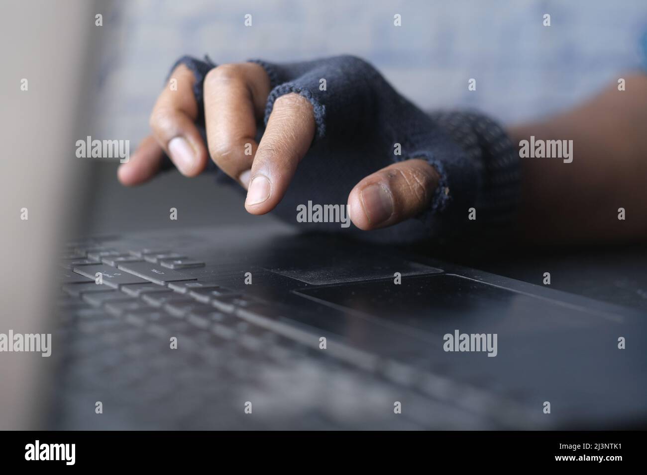 hacker hand stealing data from laptop top down Stock Photo - Alamy
