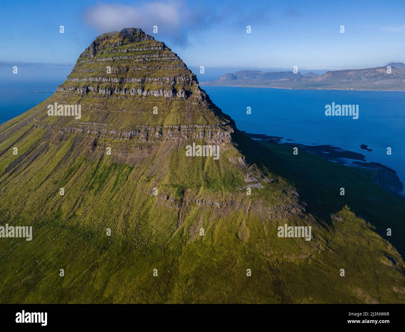 Beautiful aerial view of the Kirkjufell high mountain in Iceland, on ...