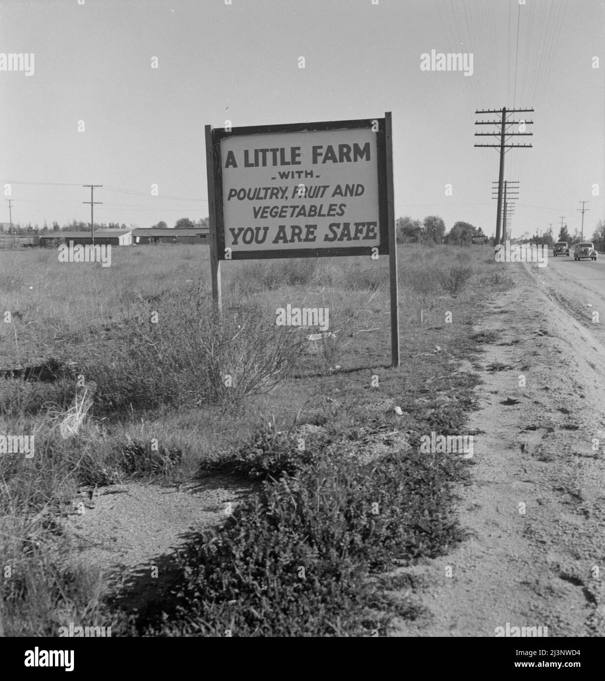 Real estate sign along the highway on which hundreds of drought ...