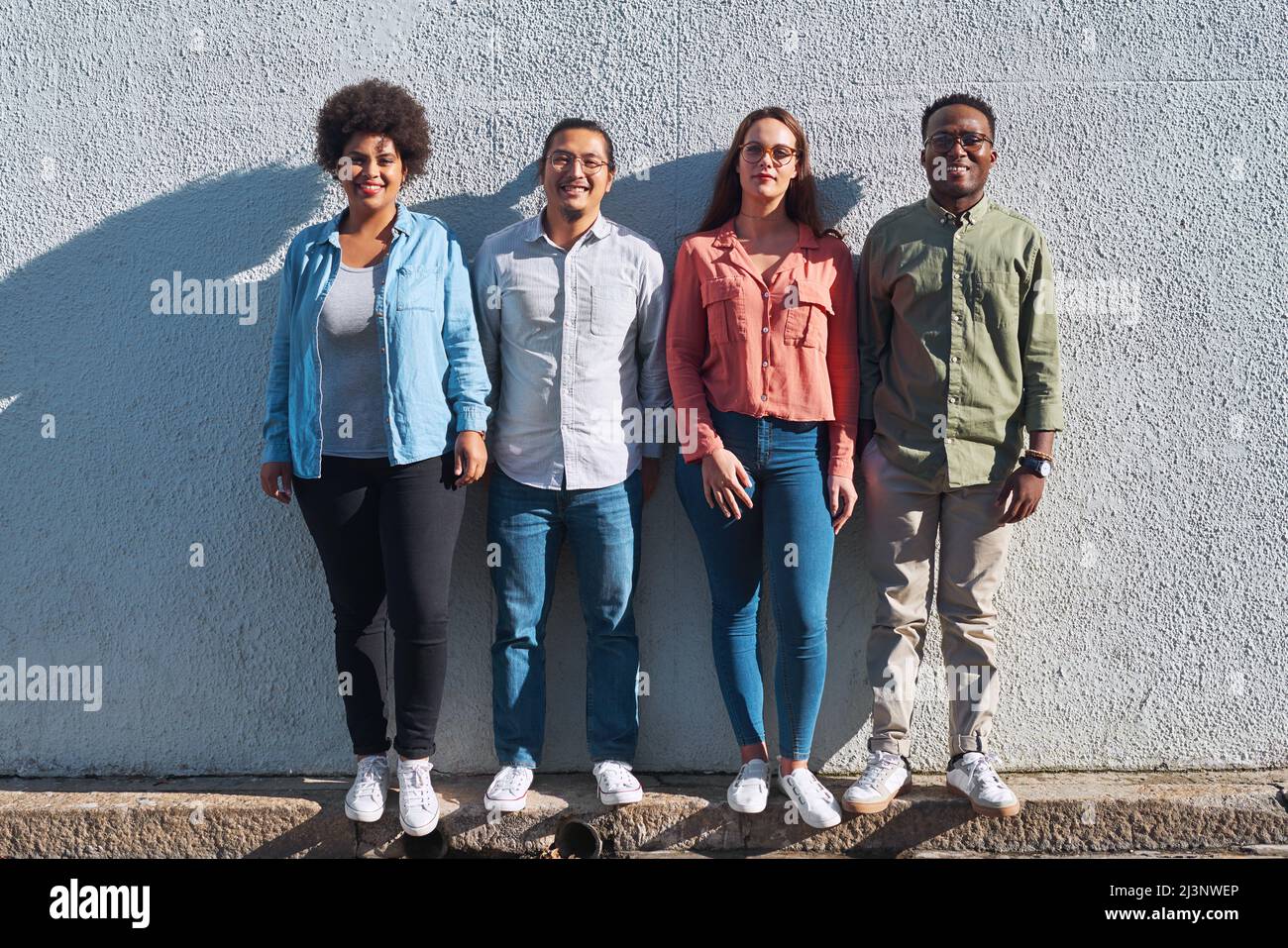 We all have a place in our community. Shot of a group of young people ...