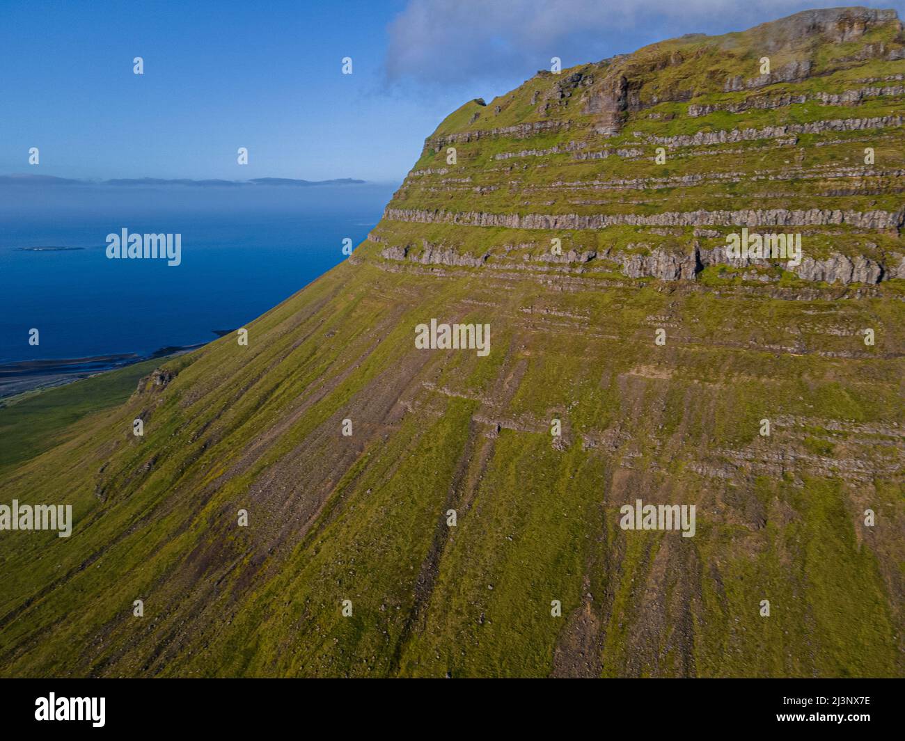 Beautiful aerial view of the Kirkjufell high mountain in Iceland, on ...