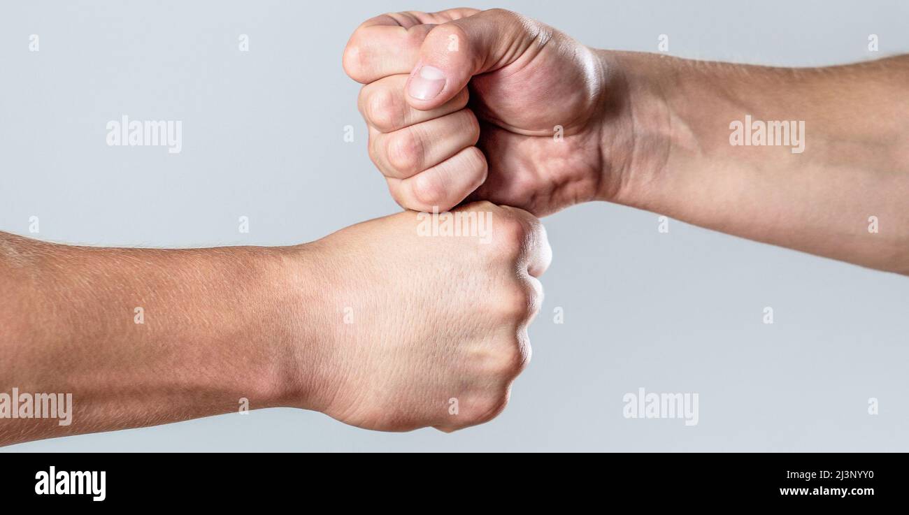 Team concept. People bumping their fists together, arms. Friendly ...