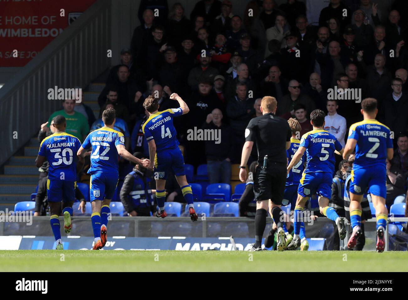 GOAL: Alex Woodyard #4 of AFC Wimbledon celebrates scoring Stock Photo ...