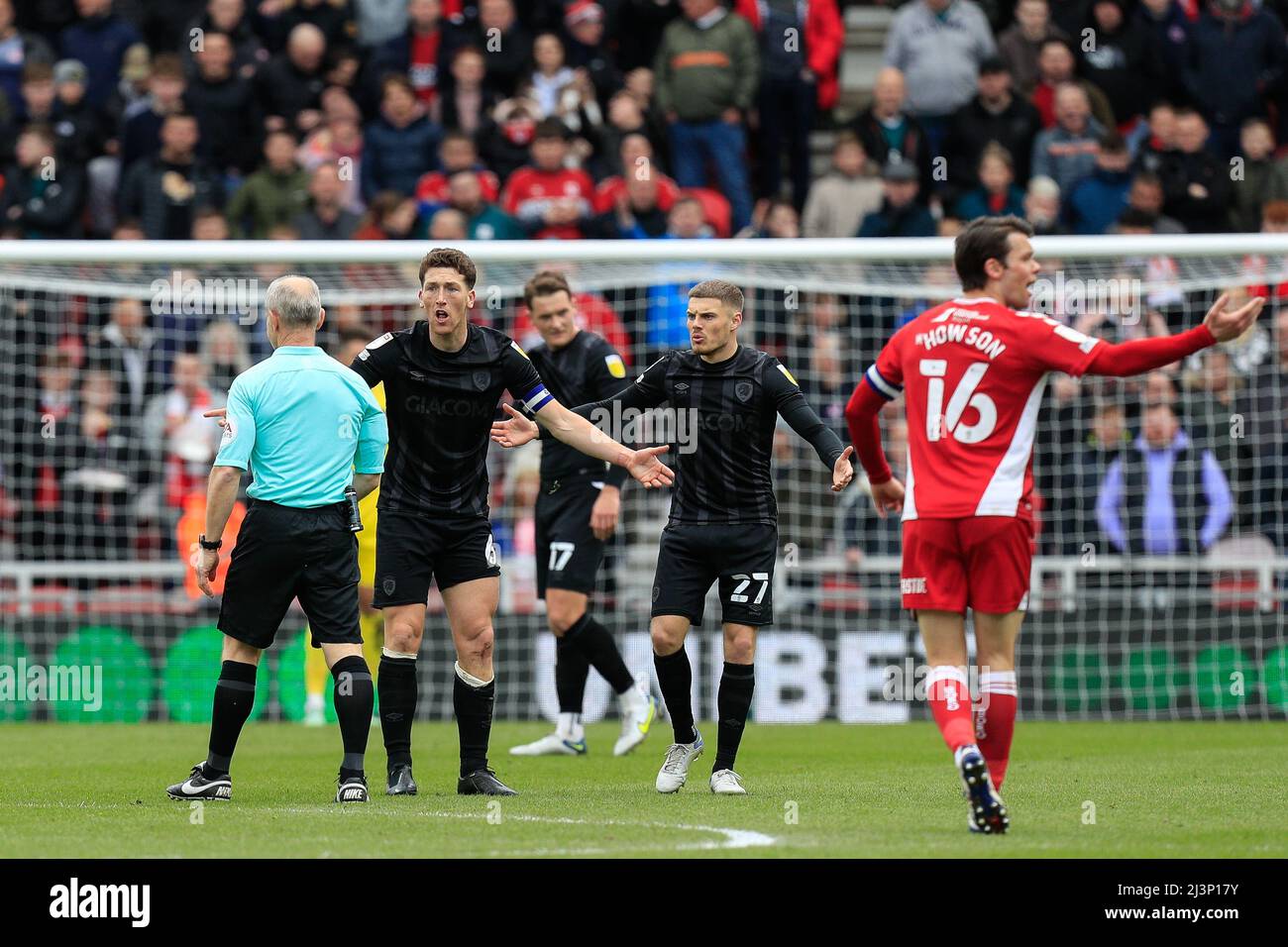 Richard Smallwood #6 of Hull City complains to Referee Andy Woolmer ...