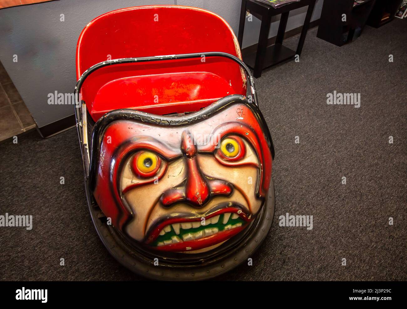 Retro Bumper Car On Display With Painted Face Stock Photo - Alamy