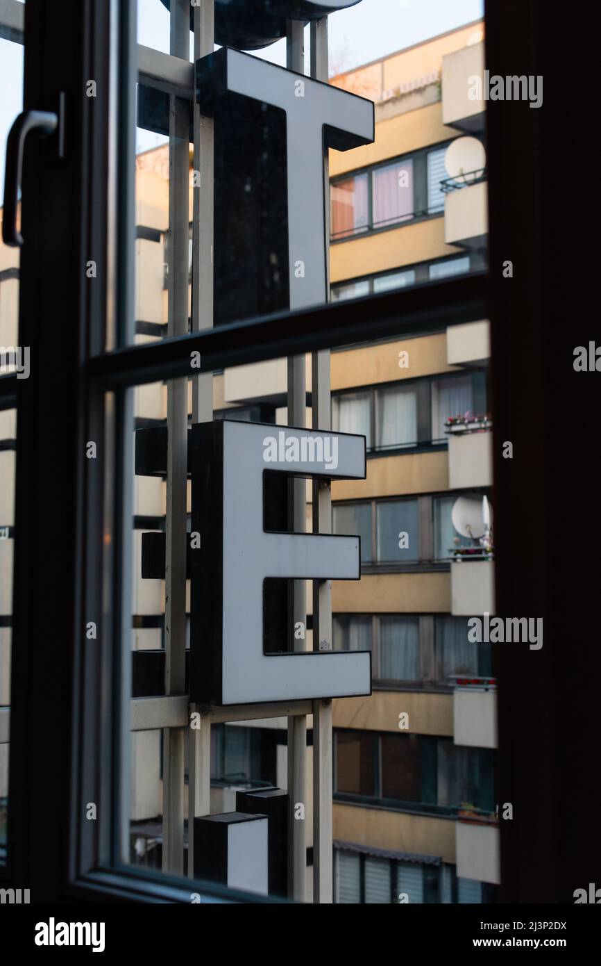 Part of a hotel-sign seen through the window of a hotel room Stock ...