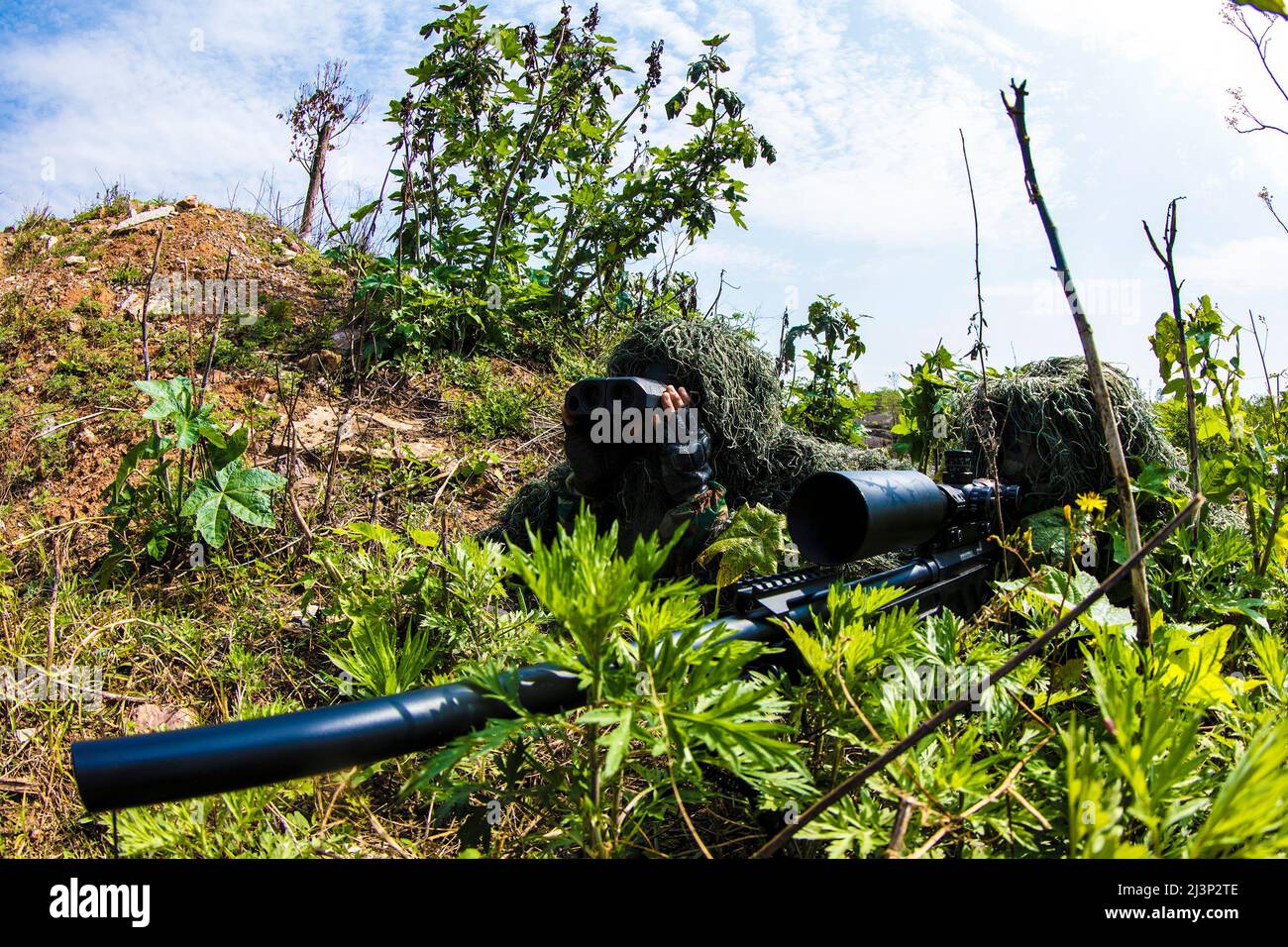 QIANXINAN, CHINA - APRIL 9, 2022 - Special forces soldiers use a laser ...