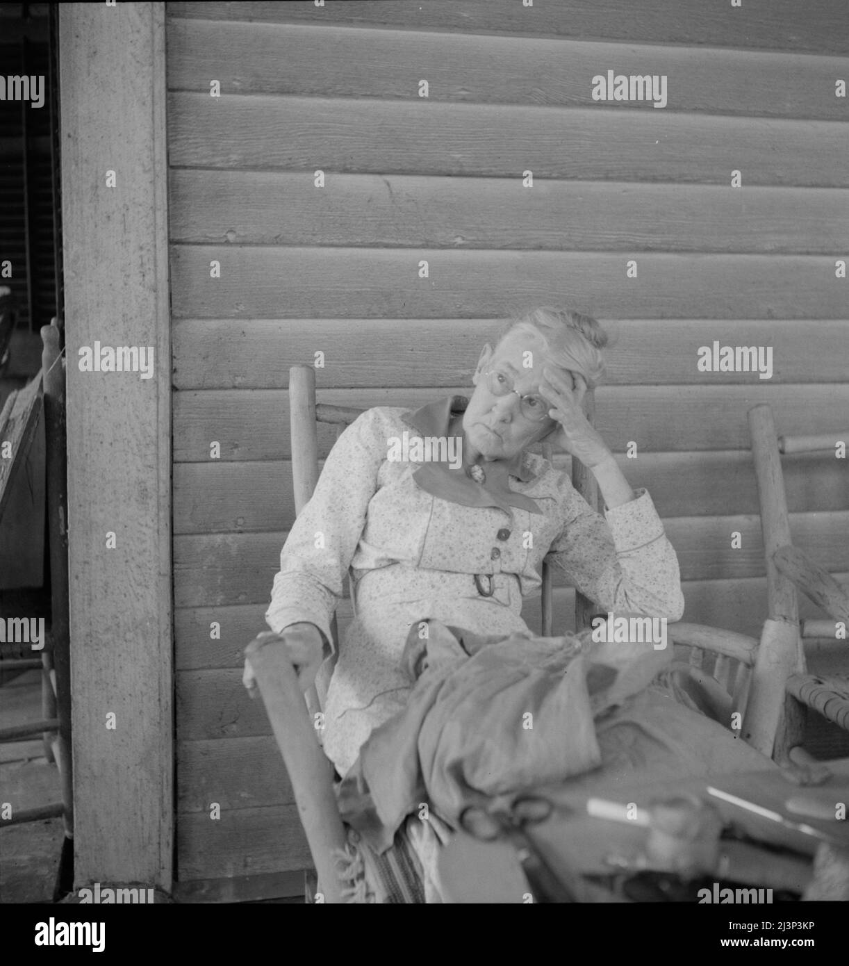 Southern lady on the veranda of the "Big House" at the Wray Plantation ...