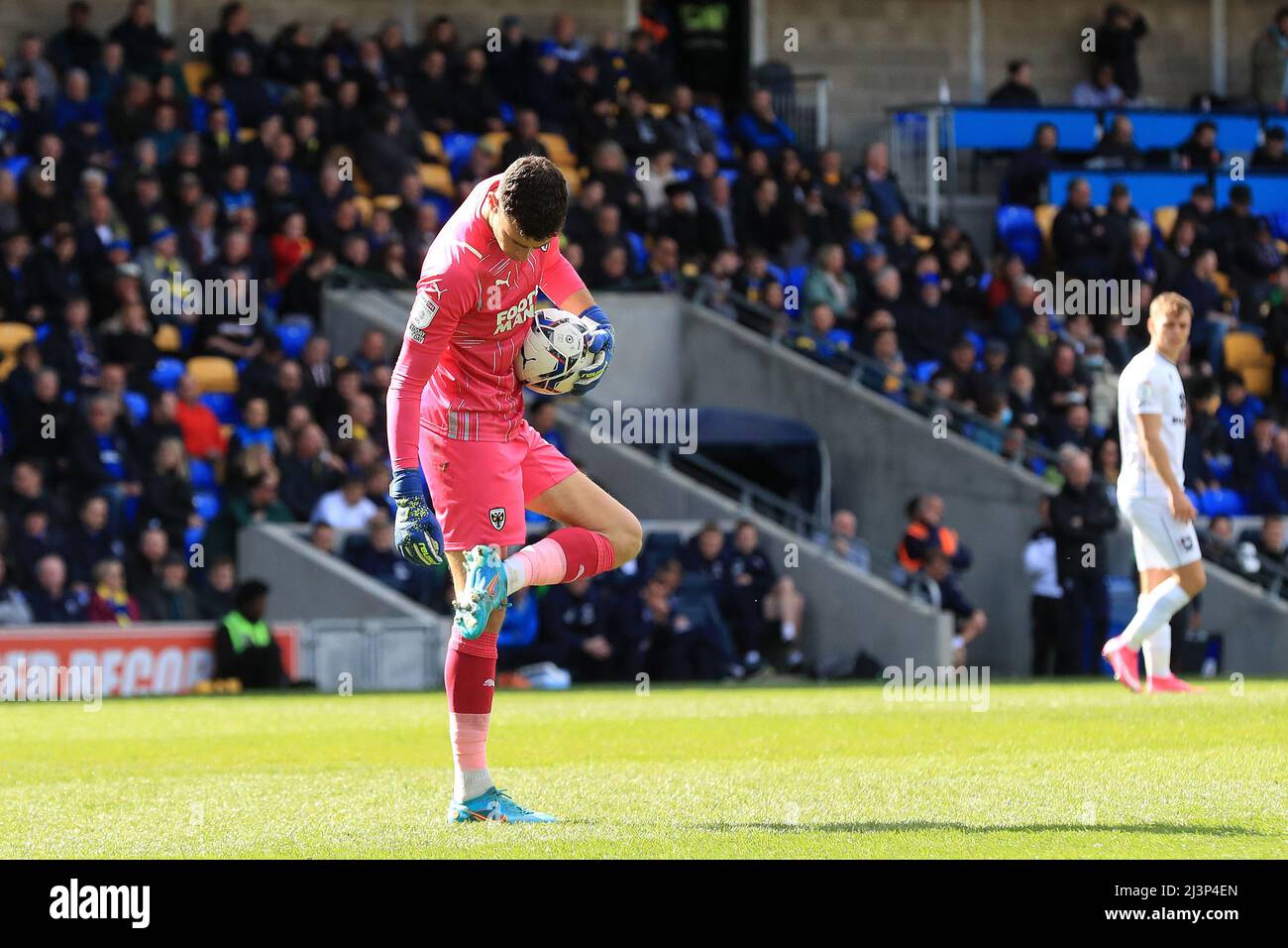 Nik Tzanev #1 of AFC Wimbledon checks his footing Stock Photo - Alamy
