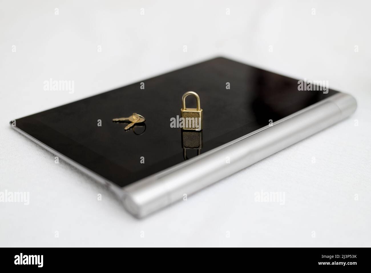 Electronic security and data protection concept. Tablet computer and ...