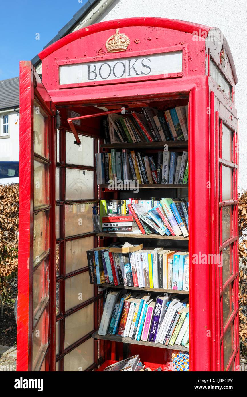 Old disused traditional GPO red telephone box now converted to a ...