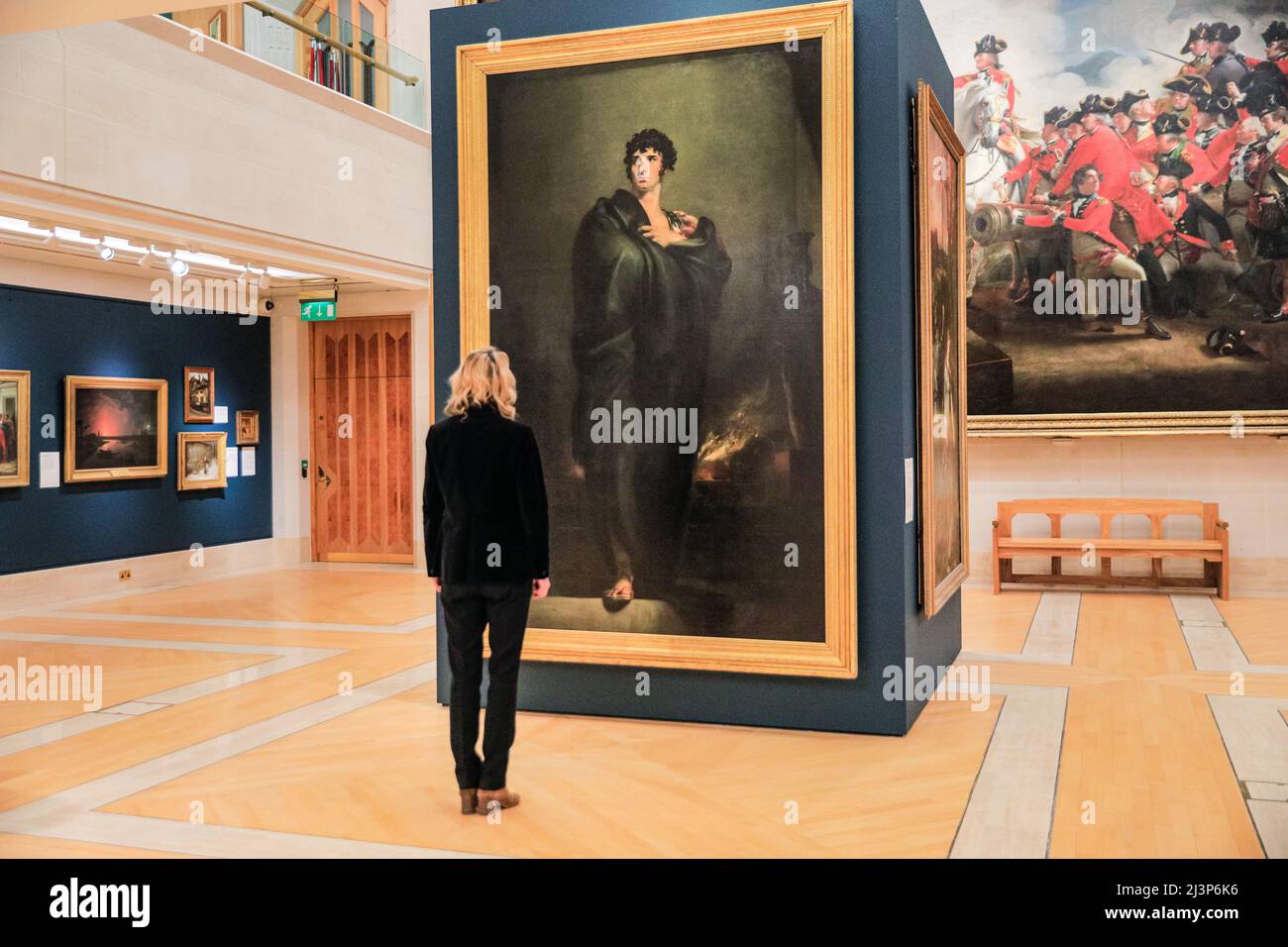 London, UK. 09th Apr, 2022. A gallery volunteer with Sir Thomas ...