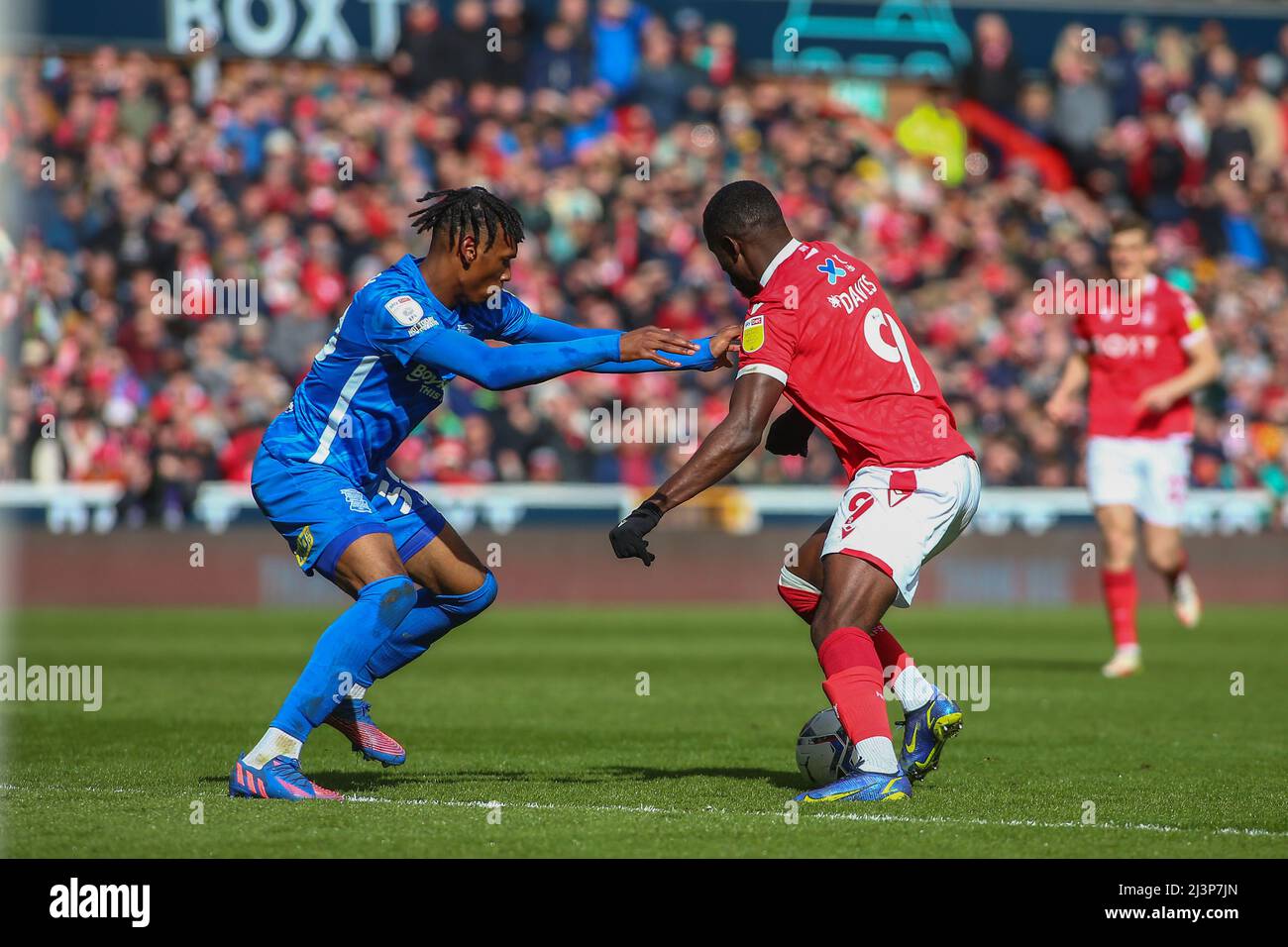 Keenan Davis #9 of Nottingham Forest looks to beat his man Stock Photo ...