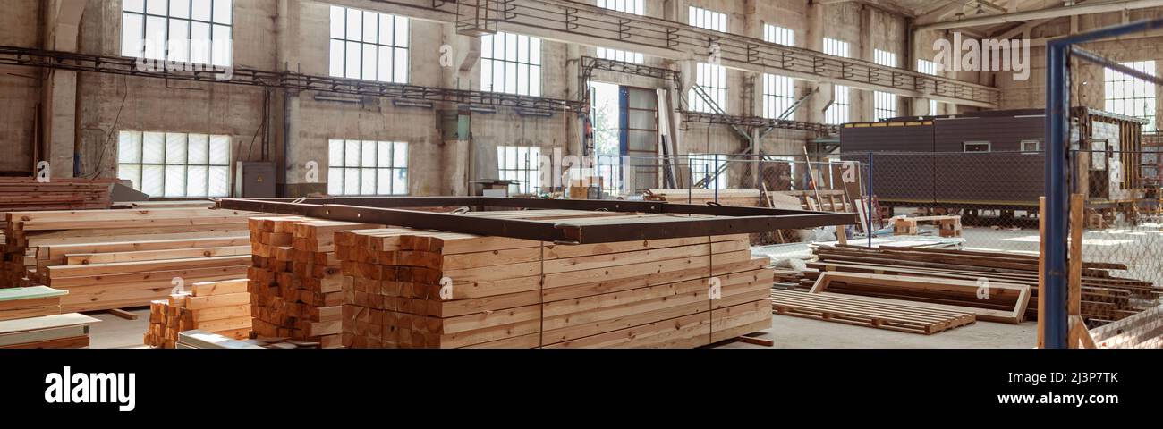 Wooden planks and bricks in building under construction Stock Photo - Alamy