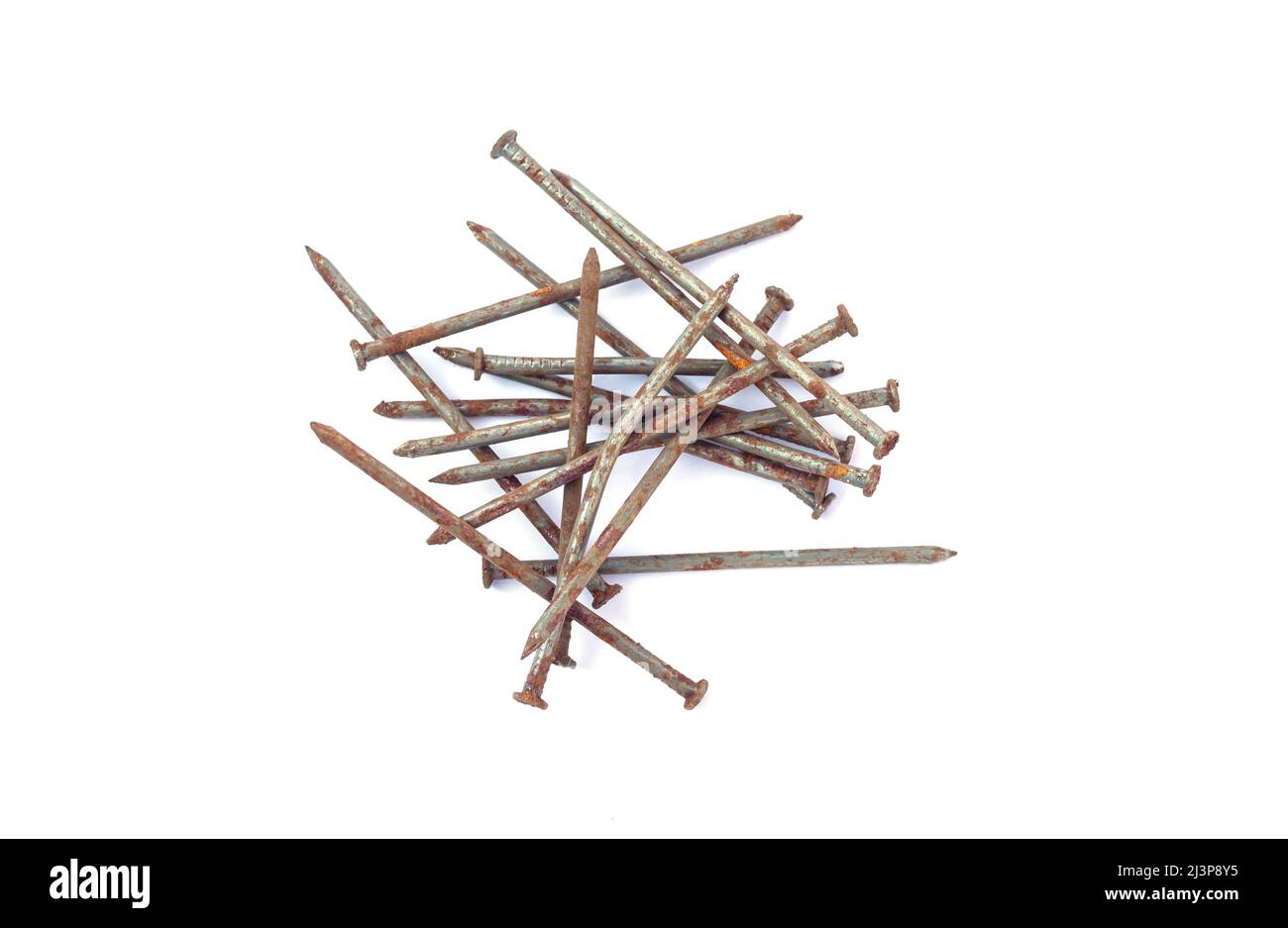 Pile of old rusty nails isolated on white background Stock Photo - Alamy