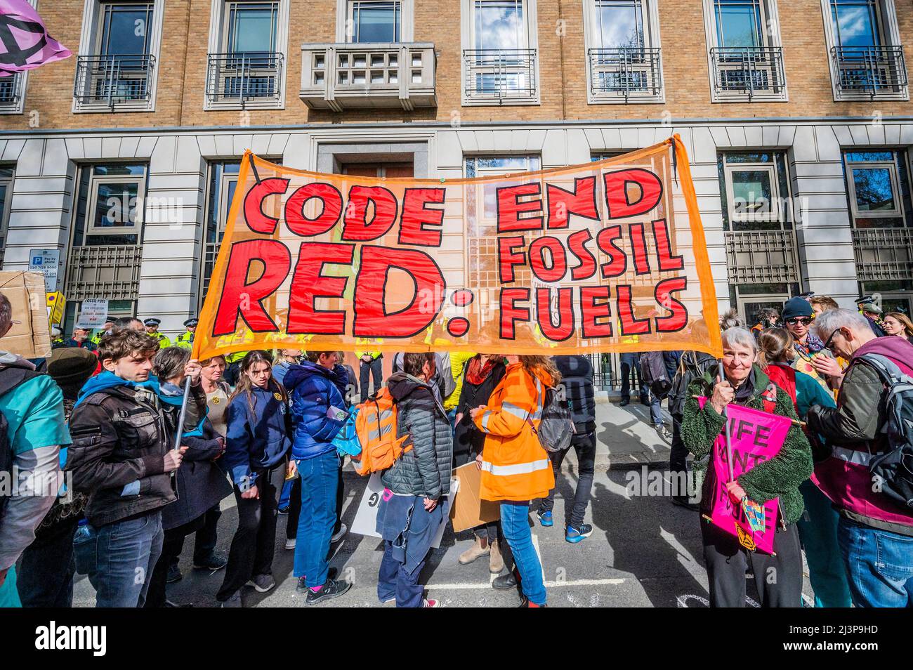 London, UK. 9th Apr, 2022. The march passes and pauses at the HQ of BP ...