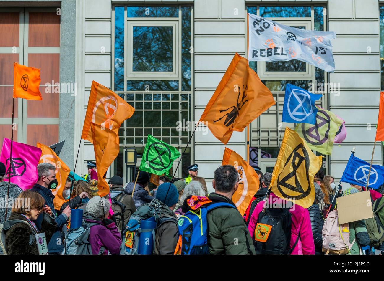 London, UK. 9th Apr, 2022. The march passes and pauses at the HQ of BP ...