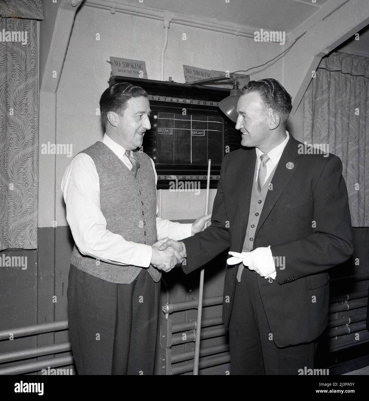 1960, historical, a male snooker player in a shirt & tie and woollen ...