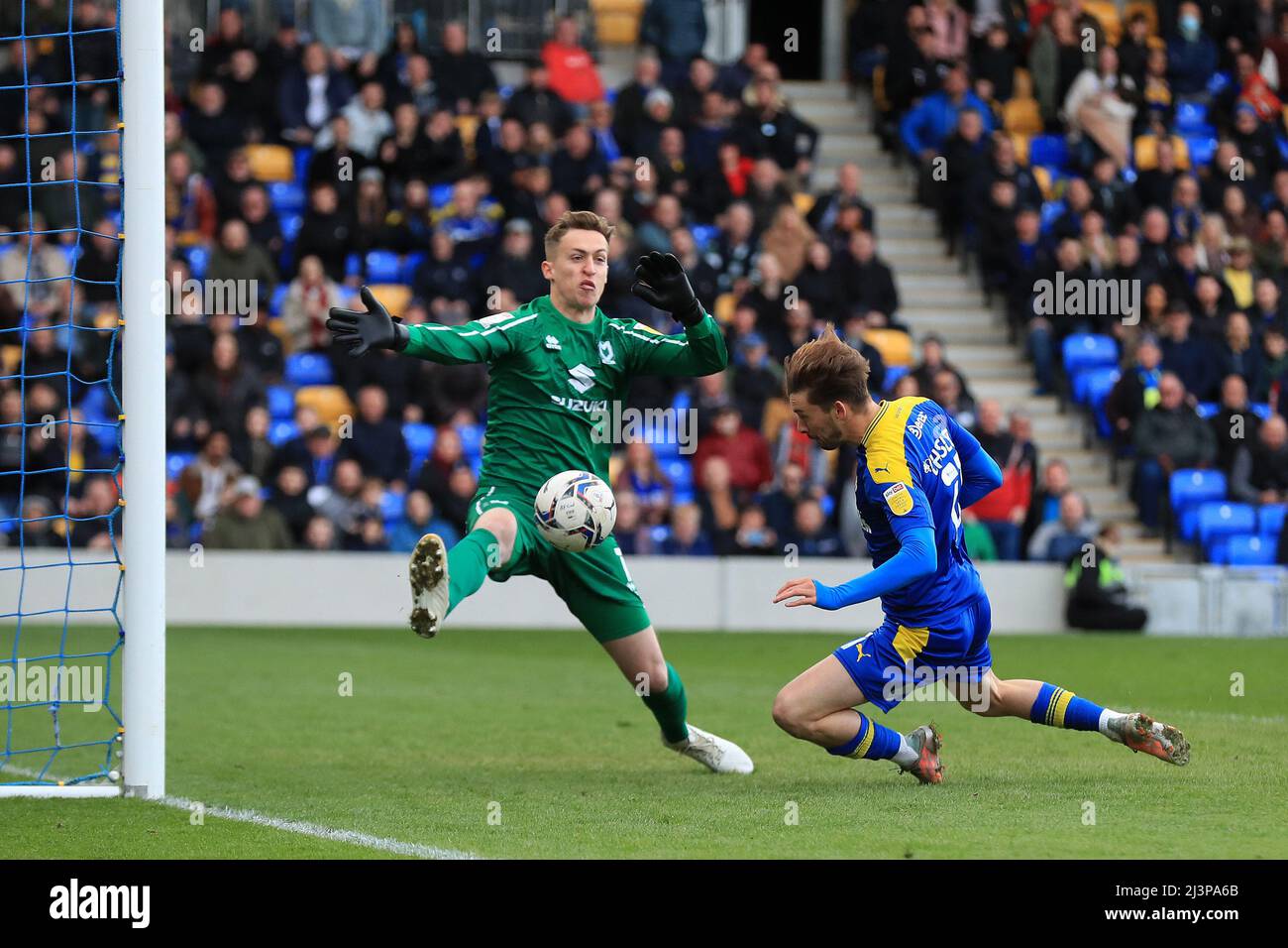 Ethan Chislett #11 of AFC Wimbledon misses a glorious chance for the ...