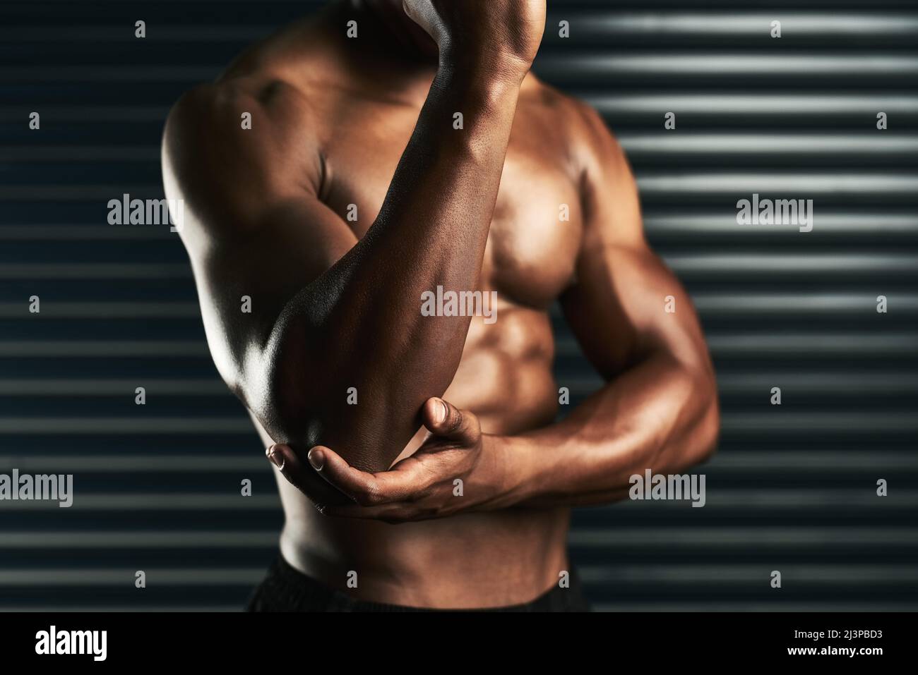 Strengthen the muscles around your joints. Studio shot of an ...