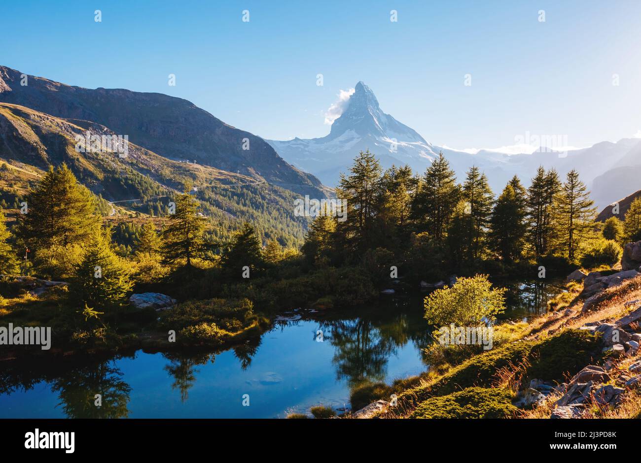 Great panorama with famous peak Matterhorn in alpine valley. Popular ...