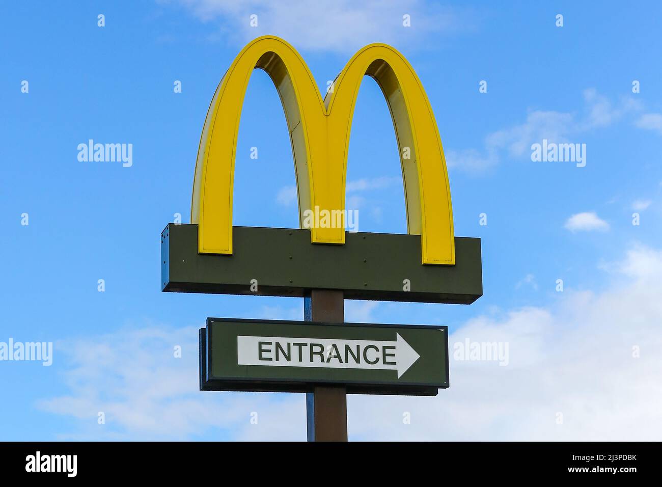 A McDonald's sign outside it's drive thru branch Stock Photo - Alamy