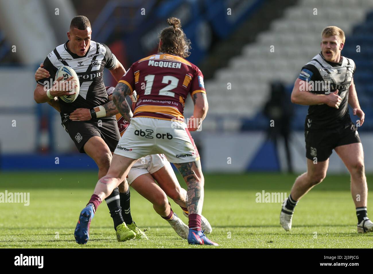 Kane Evans #16 of Hull FC runs with the ball Stock Photo - Alamy