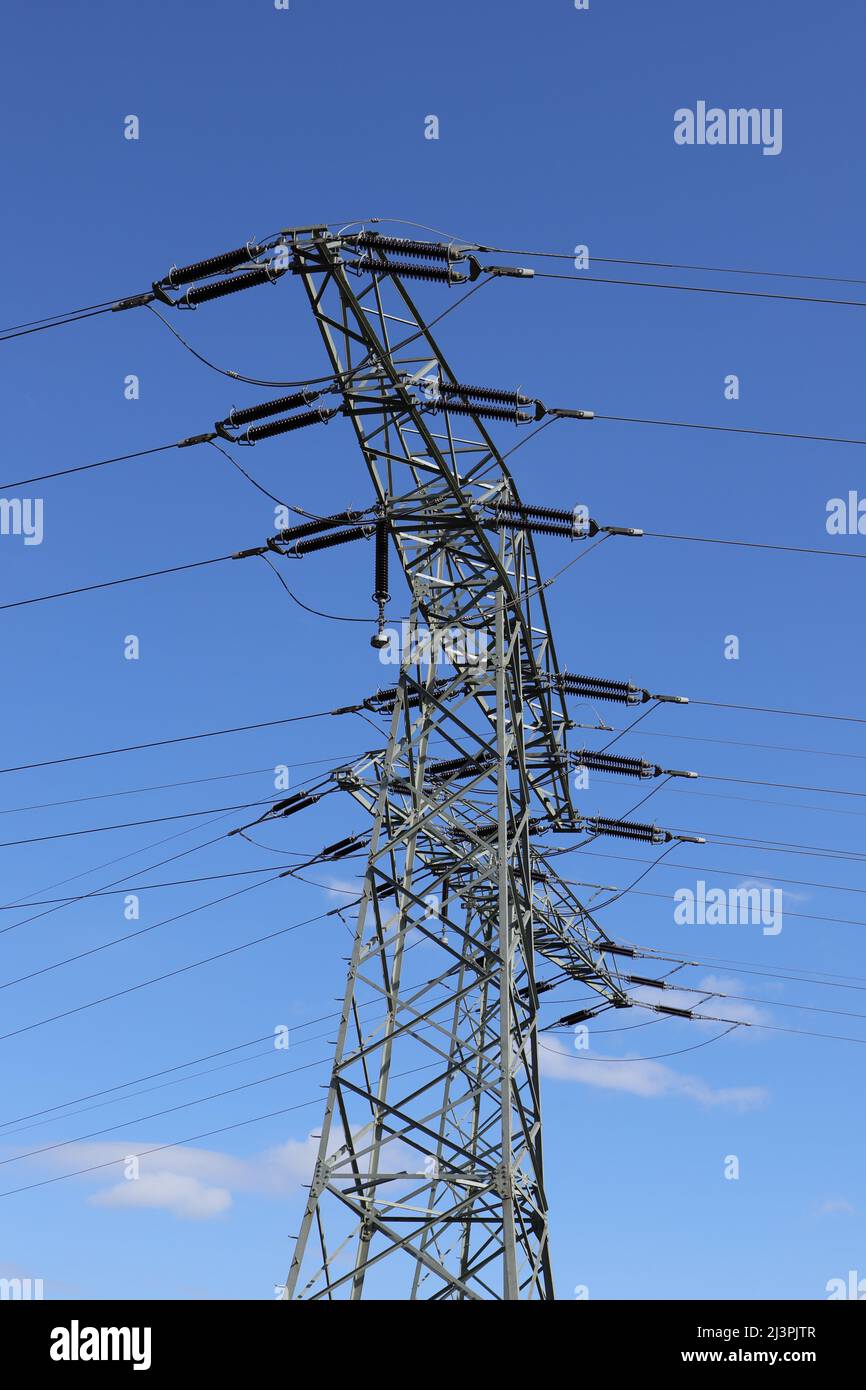 a pylon with blue sky Stock Photo - Alamy