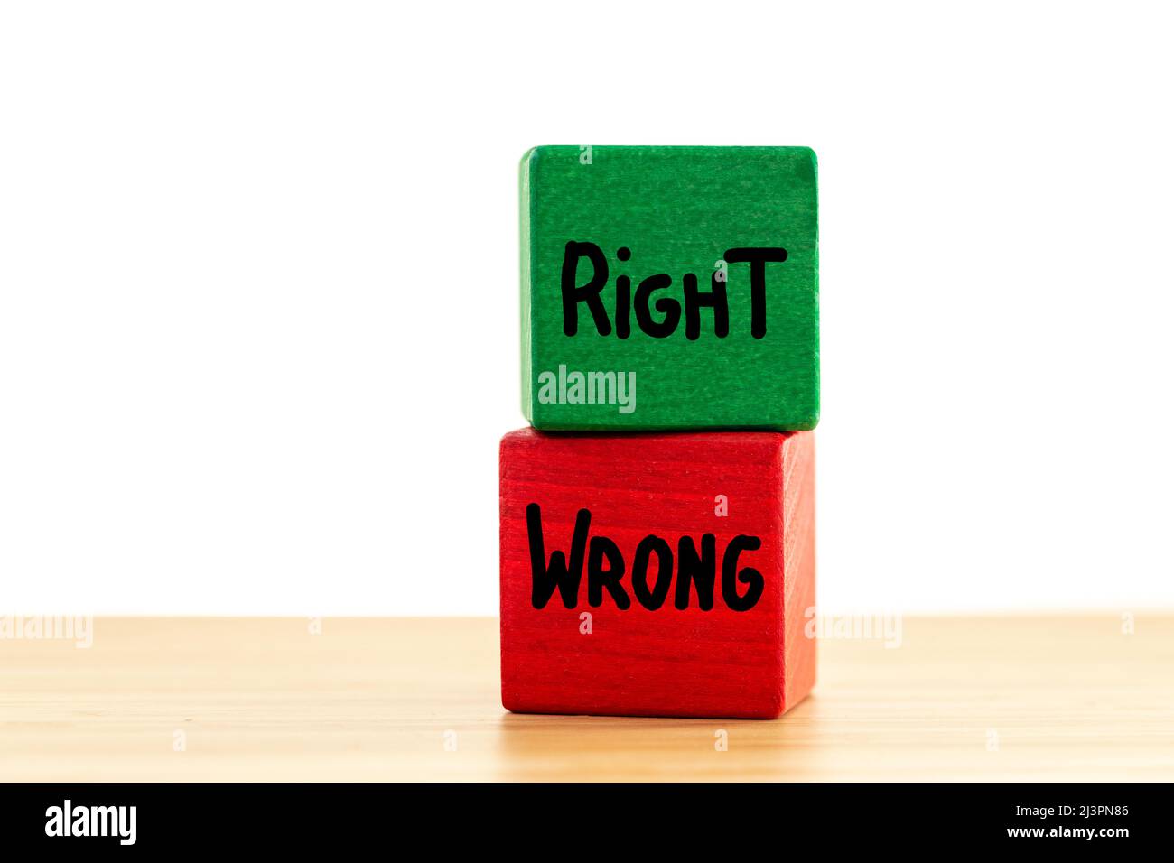 Wrong and right, handwritten inscription on colored wooden blocks, the ...