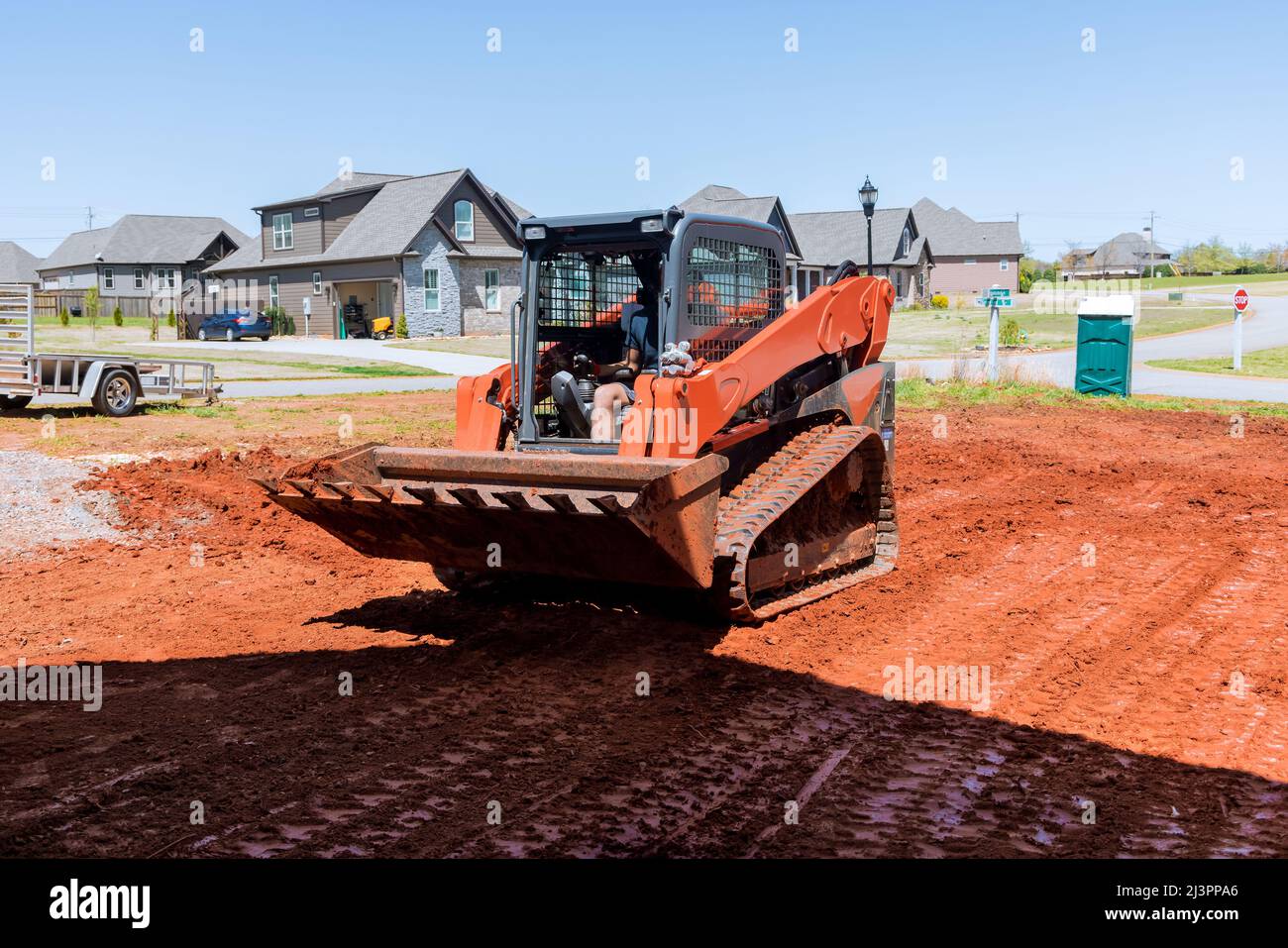Bulldozer at work with during landscaping works Stock Photo - Alamy