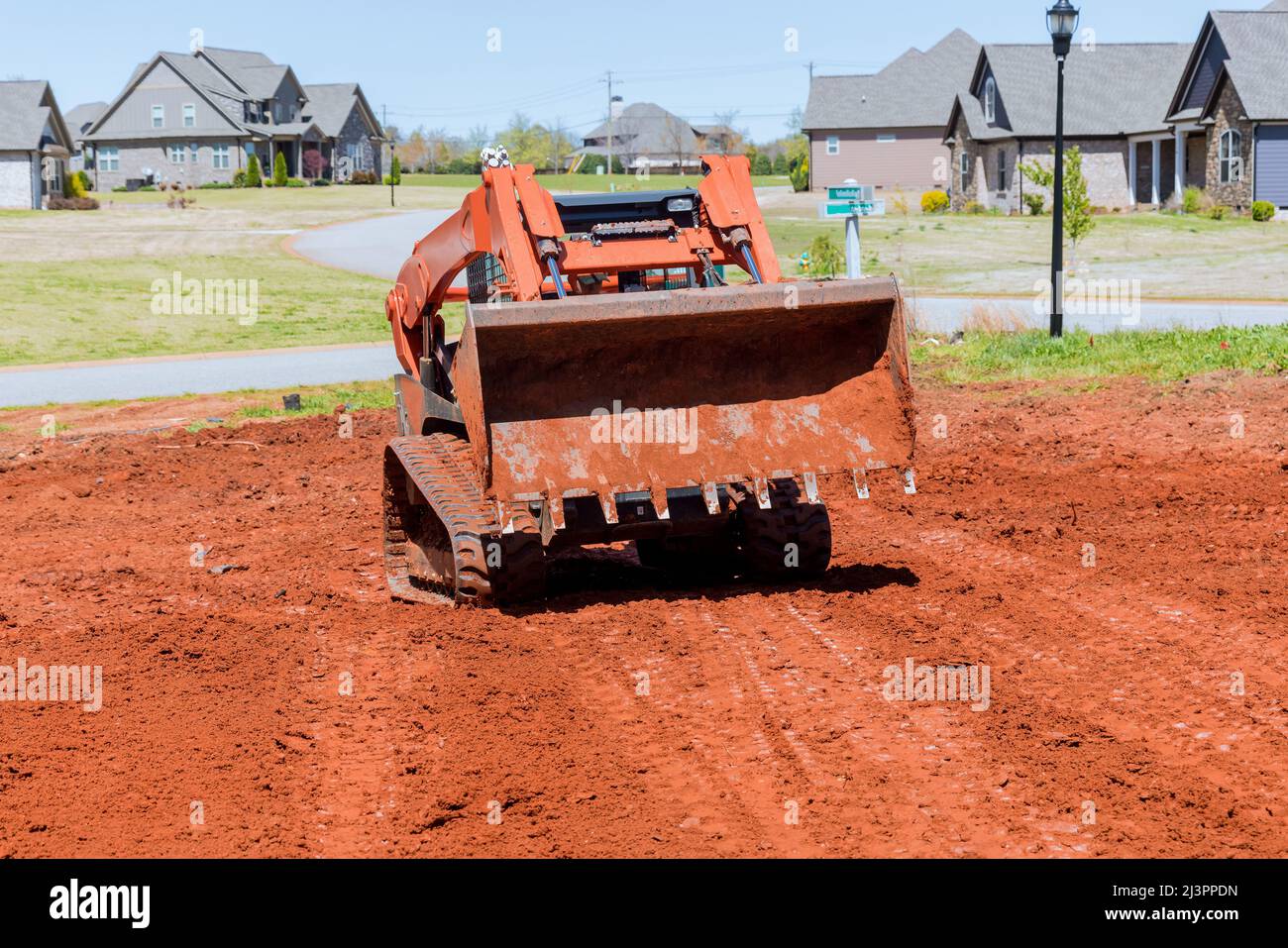 Bulldozer performing landscaping works the territory improvement Stock ...