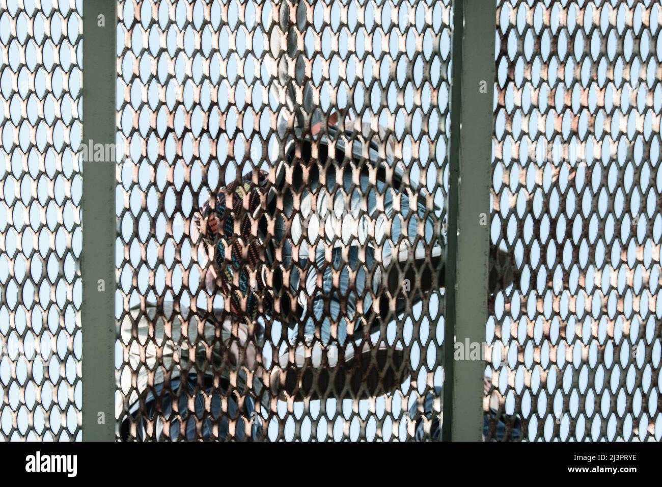 People walk on a metal grid Stock Photo - Alamy