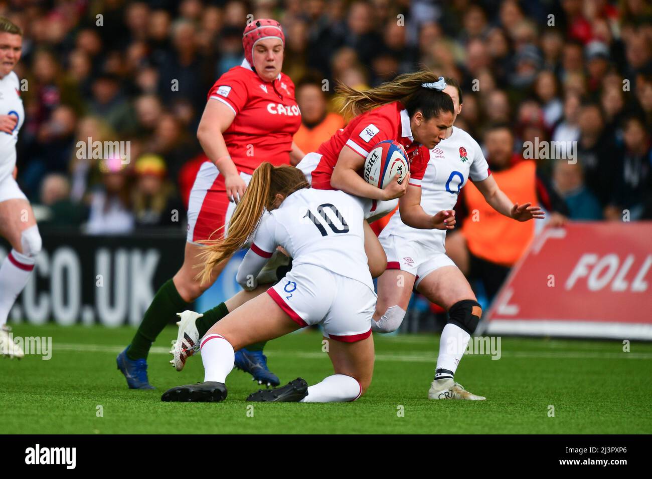 Zoe Harrison of England Women tackles Kayleigh Powell of Wales Women ...