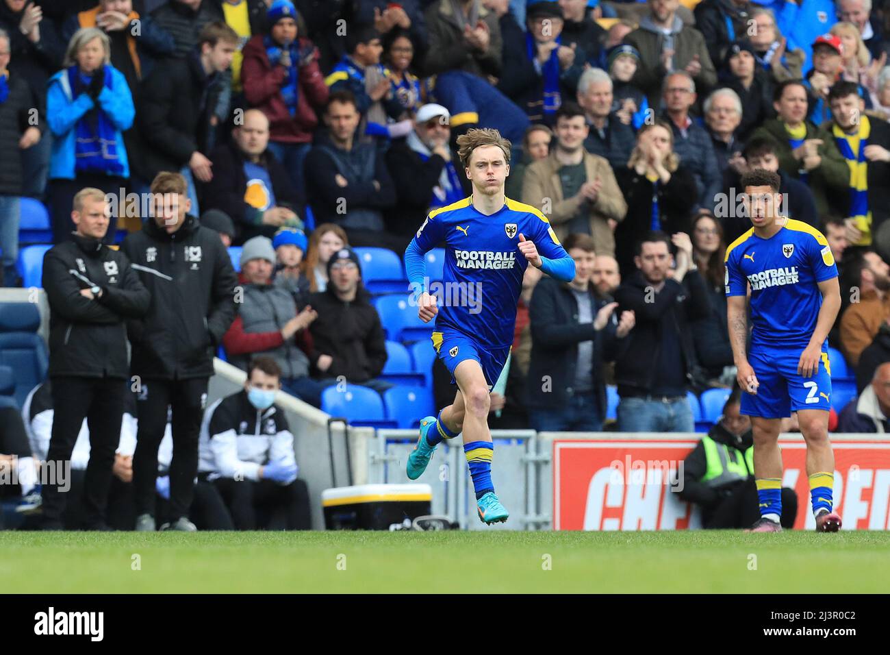 Luke McCormick #21 of AFC Wimbledon comes on for Ayoub Assal #10 of AFC ...