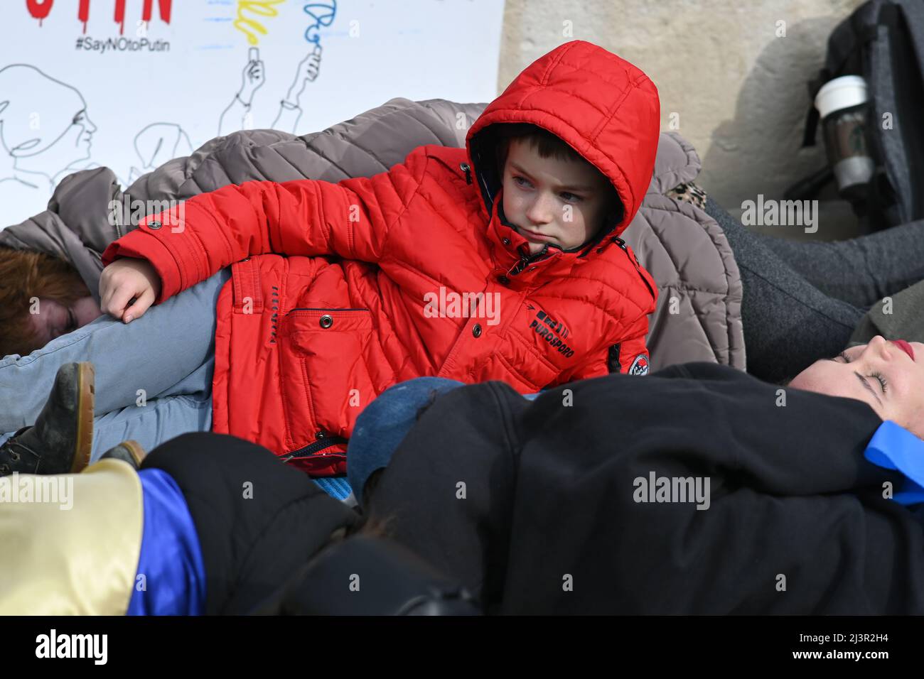 Hundreds Ukrainians diein and mother in fake blood protest Russian ...