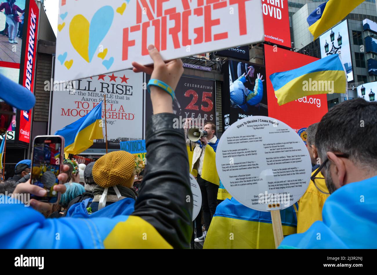 Participants hold Ukrainian flag to show support for Ukraine at Times ...