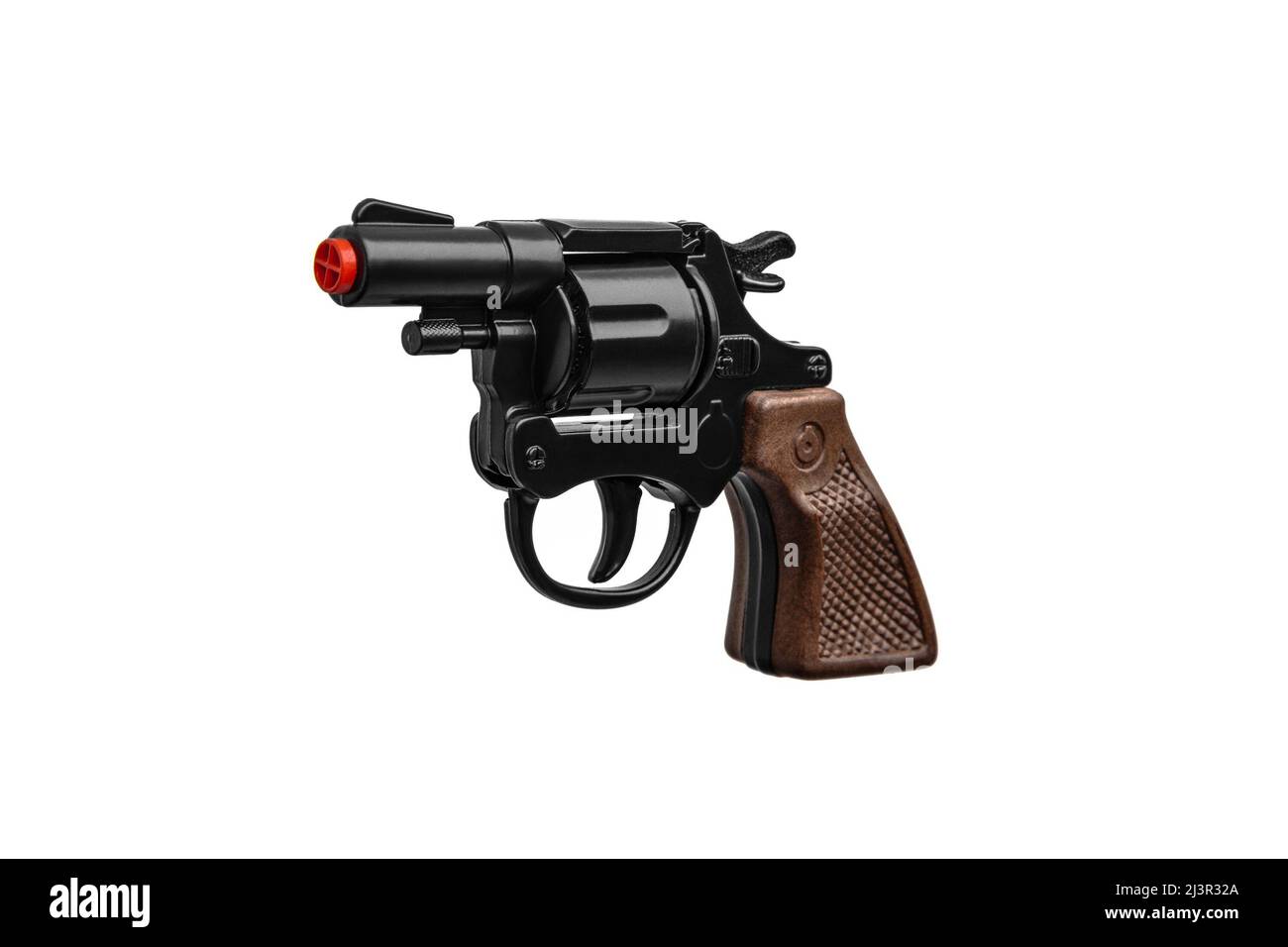 Toy gun revolver. Black pistol with brown handle. Isolate on white ...
