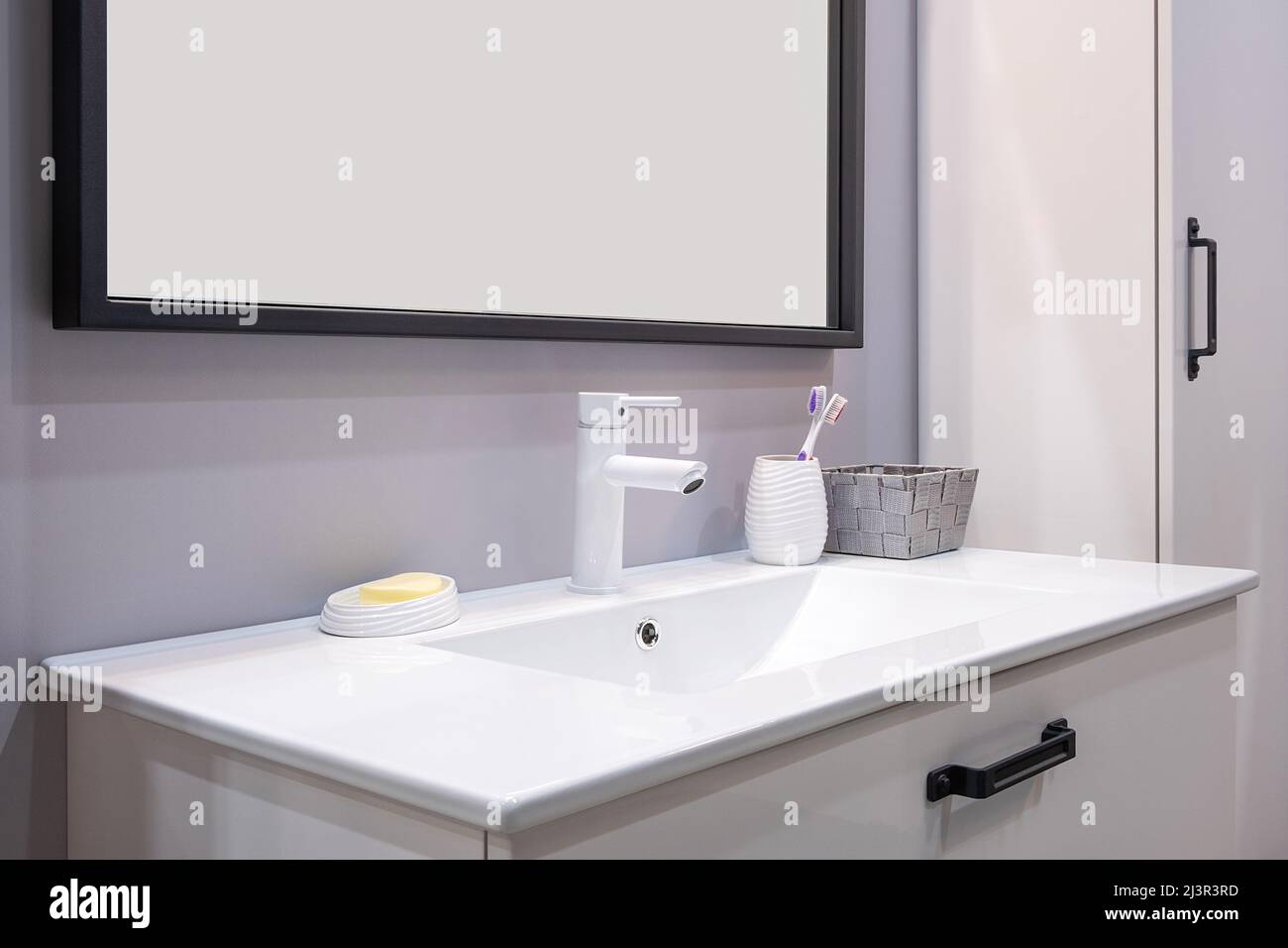 Bathroom interior with sink and faucet Stock Photo - Alamy