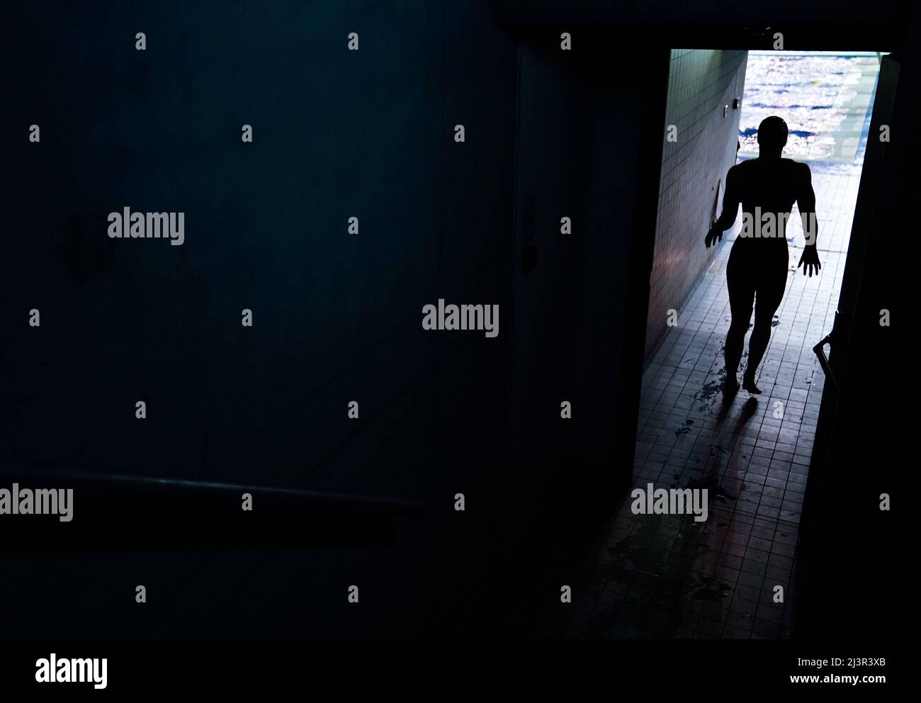 A general view of swimmers exiting the cool-down pool during day five ...