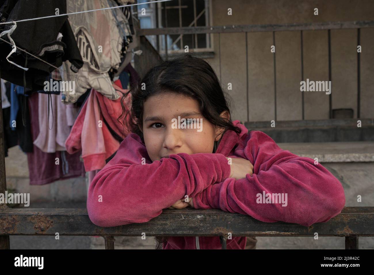 A young Roma girl is pictured at the refugee center. The Roma people ...
