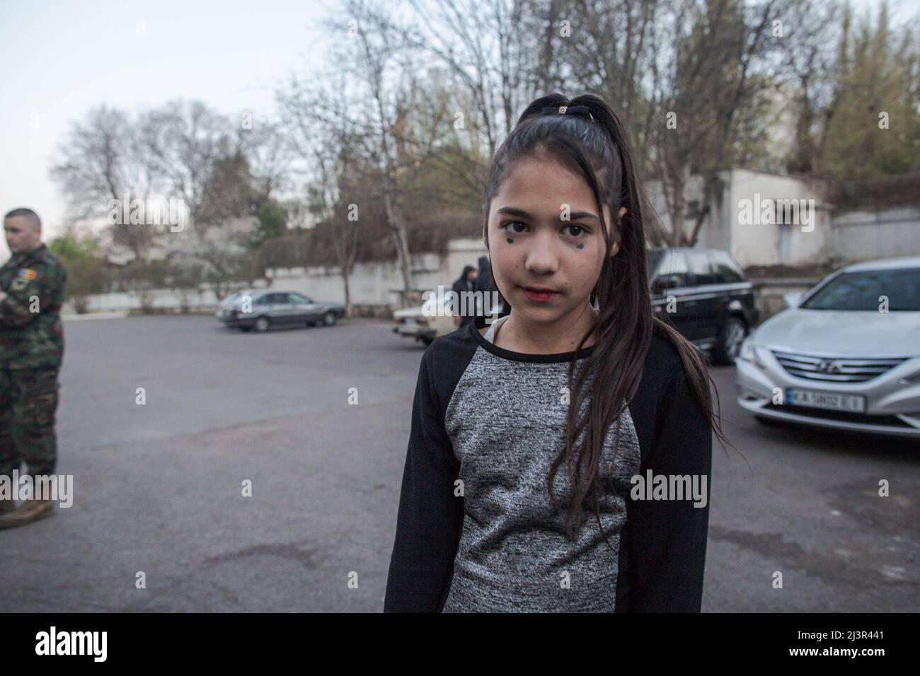 A young Roma girl pictured at the parking lot of the old university in ...
