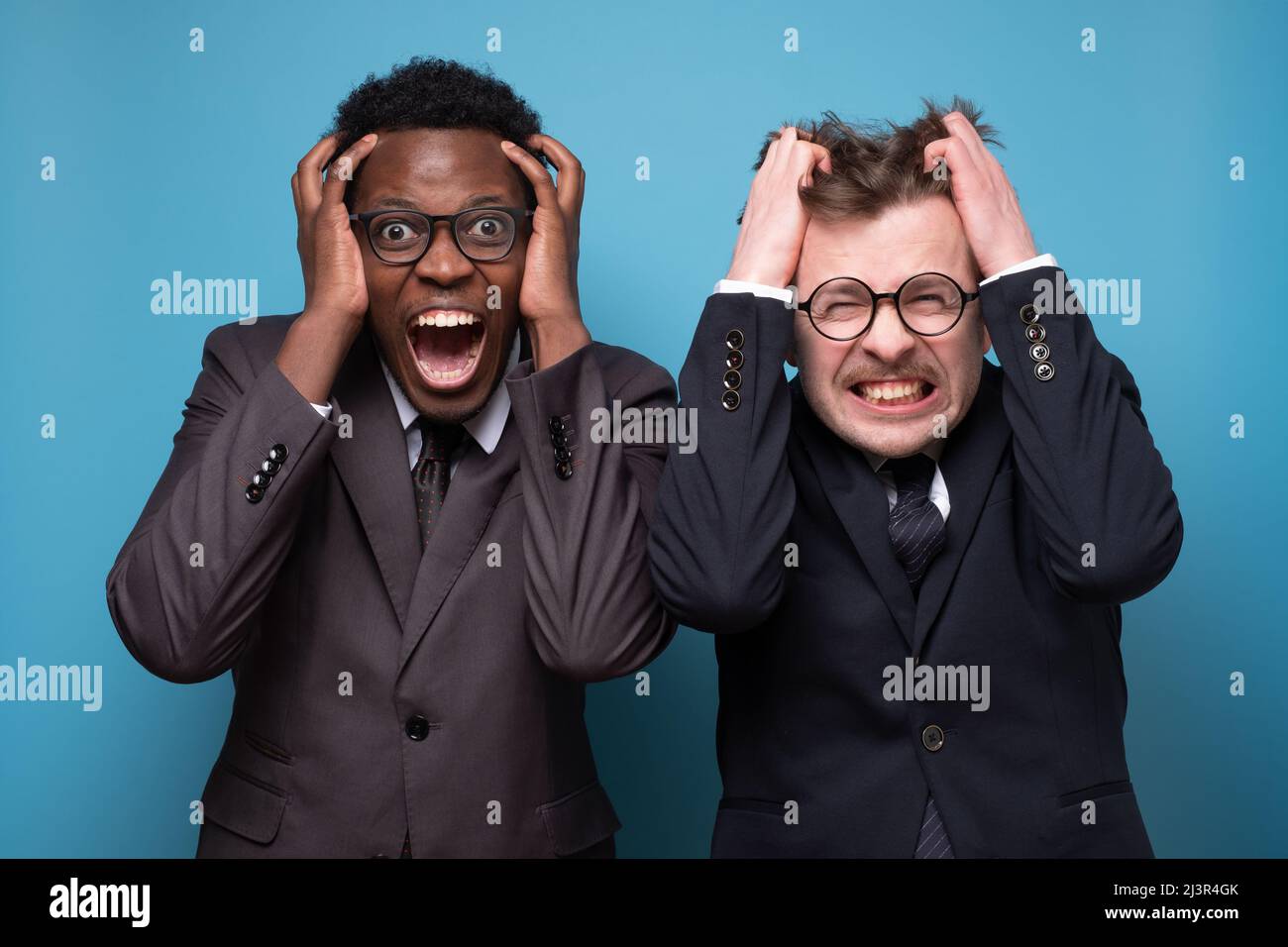 Two men getting crazy because of economy crisis. Panic in the ...