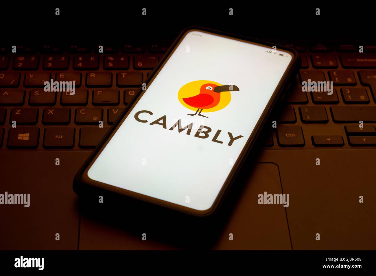 In this photo illustration the Cambly logo seen displayed on a ...
