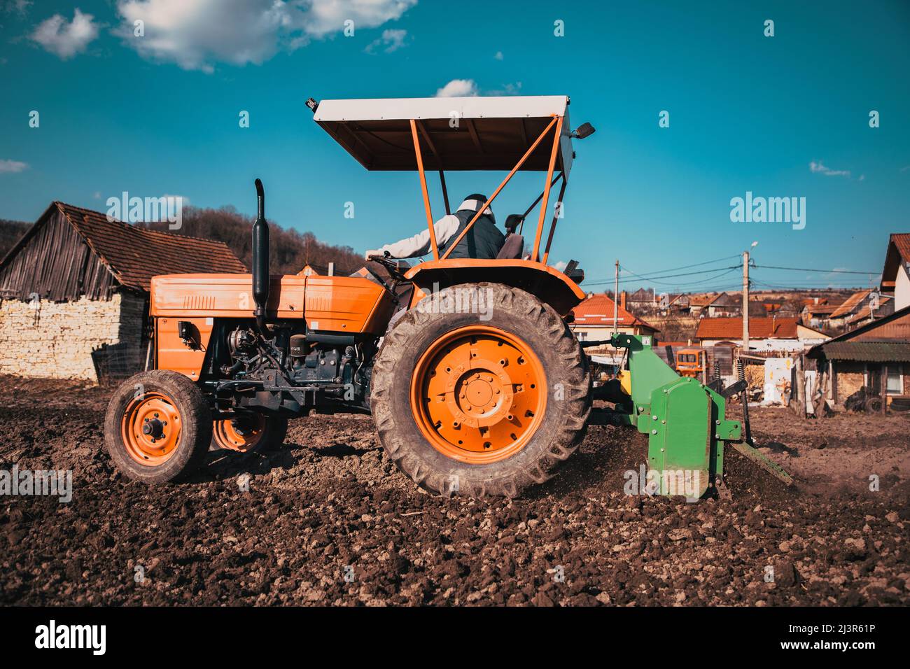 Tractor working on field hi-res stock photography and images - Alamy