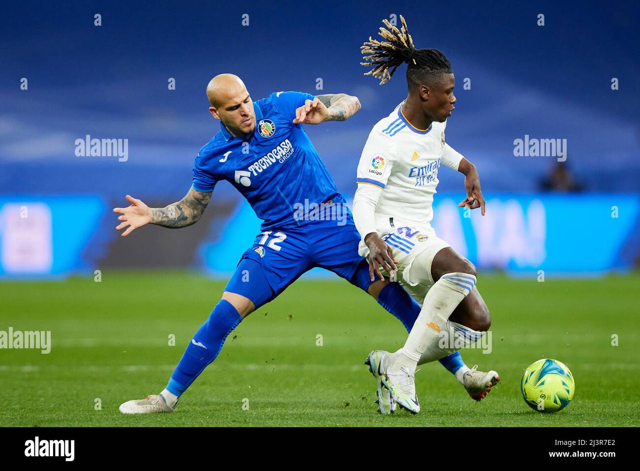 Sandro Ramirez of Getafe CF and Eduardo Camavinga of Real Madrid during ...