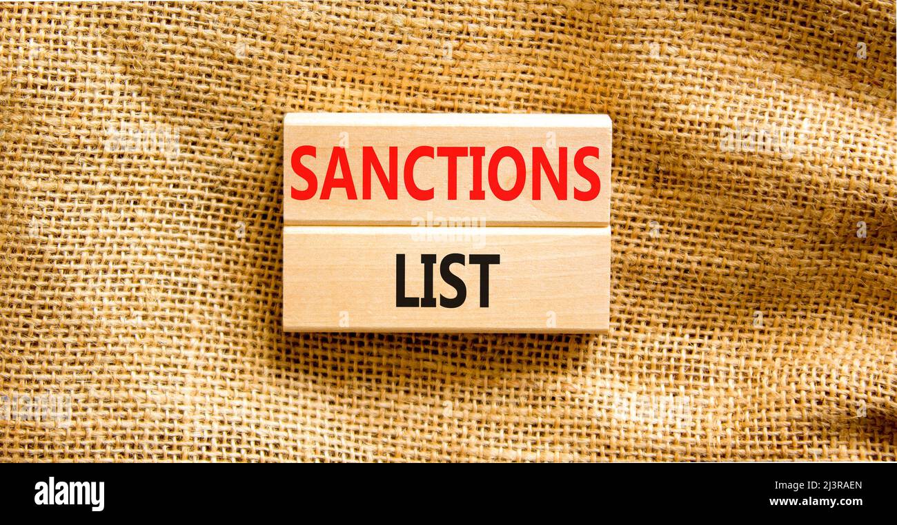 Sanctions list symbol. Wooden blocks with concept words Sanctions list ...