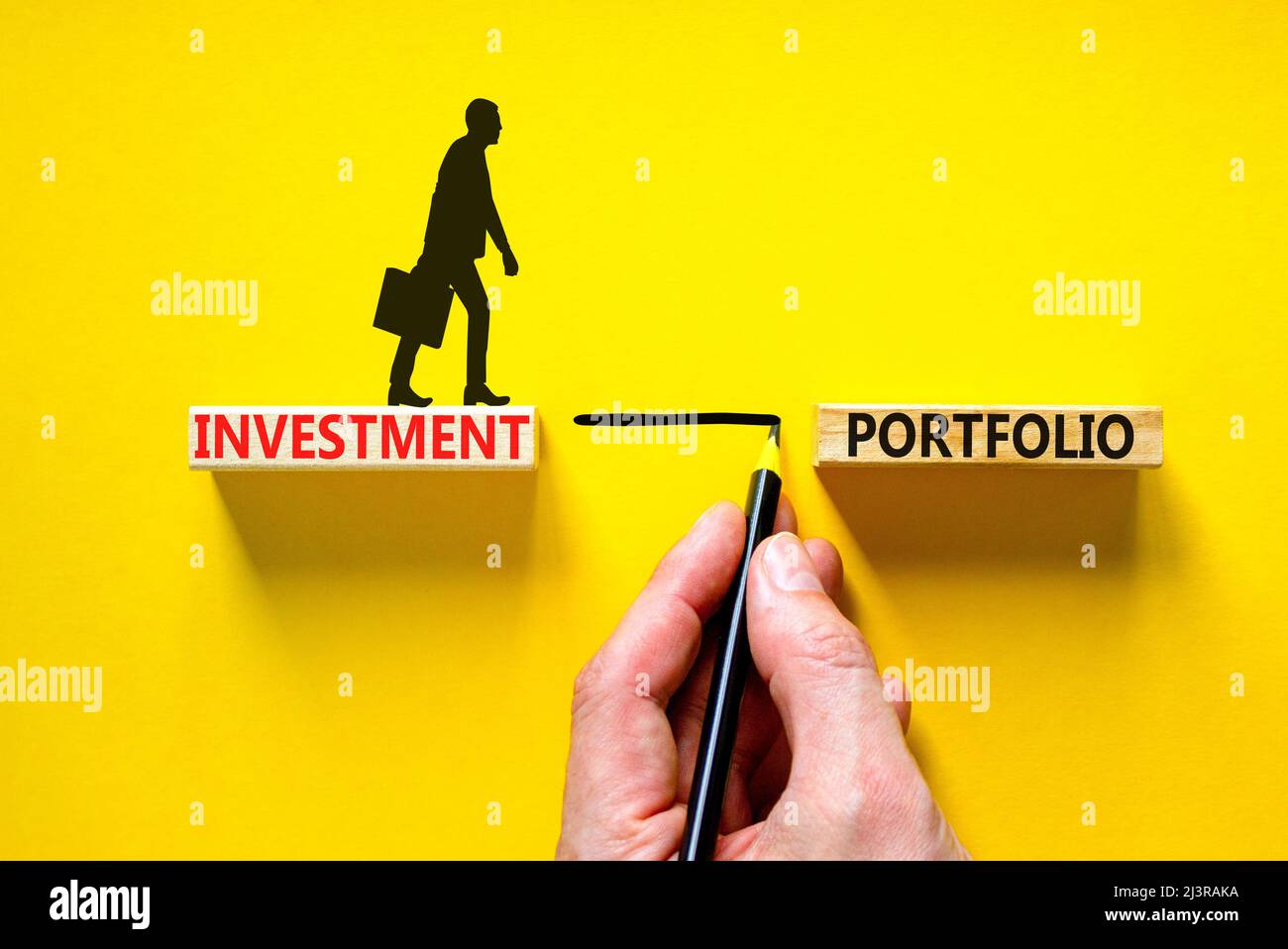 Investment portfolio symbol. Wooden blocks with concept words ...