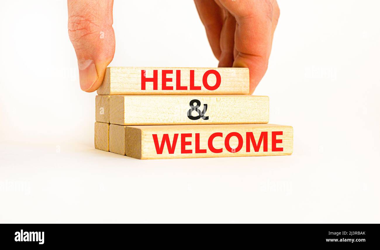 Hello and welcome symbol. Concept words Hello and welcome on wooden ...