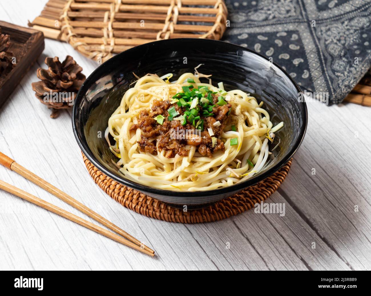 Datong Noodle Soup in a dish isolated on wood table side view taiwan ... Datong Noodle Soup in a dish isolated on wood table side view taiwan ...