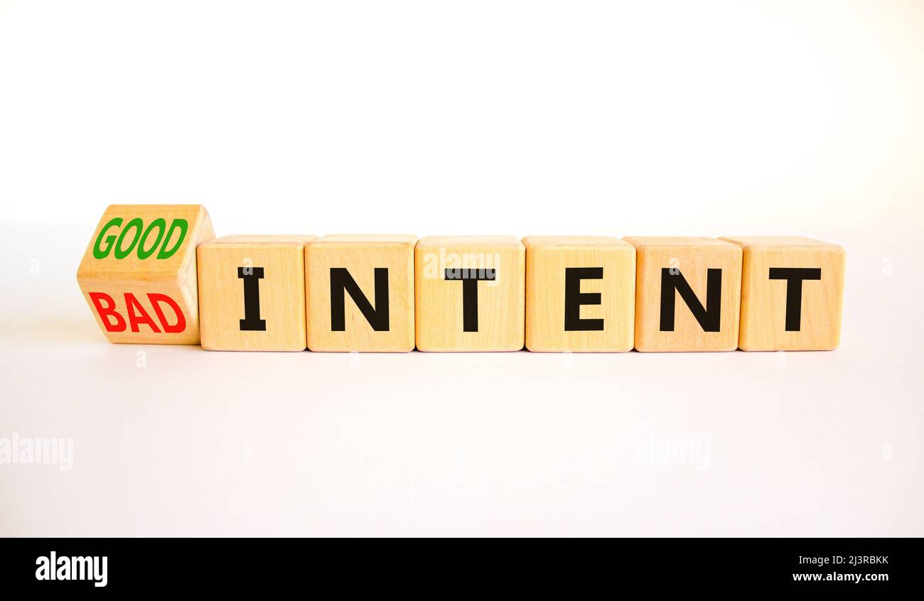 Good or bad intent symbol. Turned wooden cubes and changed concept ...